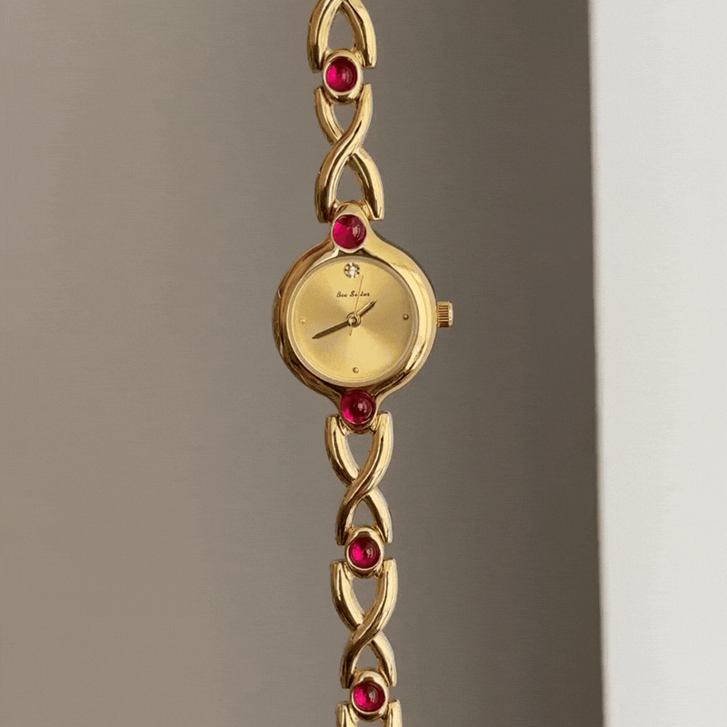 Classic Allure: Luxurious Gold Ruby Dial Watch with Gold Alloy Bezel ...