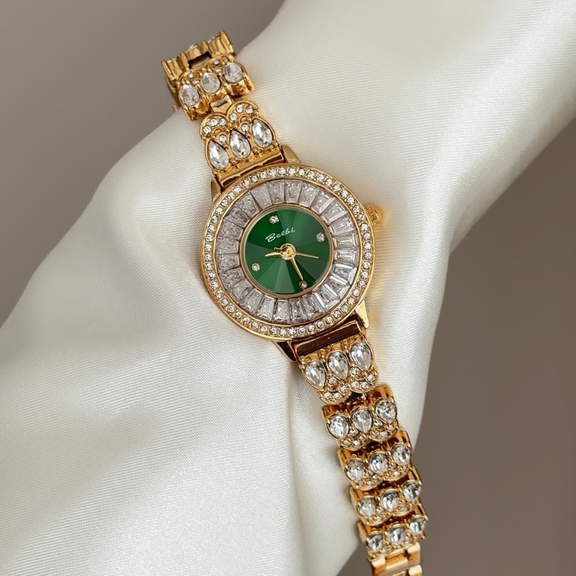 Opulent Allure: Green Dial Watch with Gold Diamond Bezel & Diamond-Set ...
